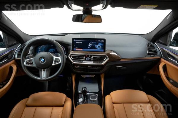 Black BMW X4 2024 in Riga, with an engine capacity of 3.00 L and mileage of 72 thousand km for 52500 €, photo 6 on AUTOMOTO.COM.LV