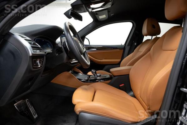 Black BMW X4 2024 in Riga, with an engine capacity of 3.00 L and mileage of 72 thousand km for 52500 €, photo 8 on AUTOMOTO.COM.LV