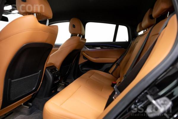 Black BMW X4 2024 in Riga, with an engine capacity of 3.00 L and mileage of 72 thousand km for 52500 €, photo 9 on AUTOMOTO.COM.LV