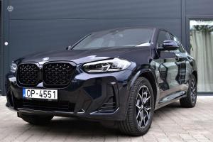 Black BMW X4 2024 in Riga, with an engine capacity of 2.00 L and mileage of 36 thousand km for 42500 €, photo 4 on AUTOMOTO.COM.LV