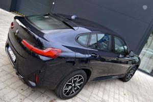 Black BMW X4 2024 in Riga, with an engine capacity of 2.00 L and mileage of 36 thousand km for 42500 €, photo 17 on AUTOMOTO.COM.LV