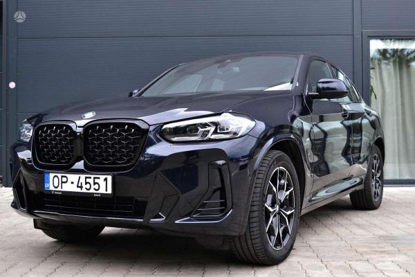 Black BMW X4 2024 in Riga, with an engine capacity of 2.00 L and mileage of 36 thousand km for 42500 €, photo 4 on AUTOMOTO.COM.LV