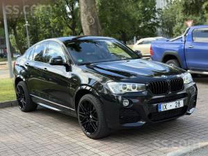 Black BMW X4 2015 in Riga, with an engine capacity of 3.00 L and mileage of 242 thousand km for 16900 €, photo 3 on AUTOMOTO.COM.LV