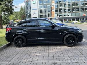 Black BMW X4 2015 in Riga, with an engine capacity of 3.00 L and mileage of 242 thousand km for 16900 €, photo 4 on AUTOMOTO.COM.LV