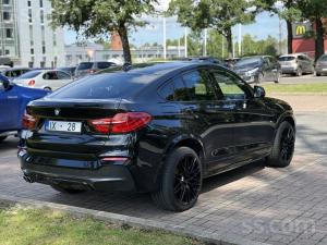 Black BMW X4 2015 in Riga, with an engine capacity of 3.00 L and mileage of 242 thousand km for 16900 €, photo 5 on AUTOMOTO.COM.LV