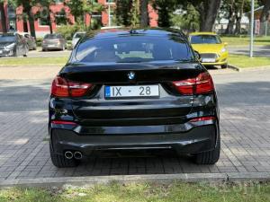 Black BMW X4 2015 in Riga, with an engine capacity of 3.00 L and mileage of 242 thousand km for 16900 €, photo 6 on AUTOMOTO.COM.LV