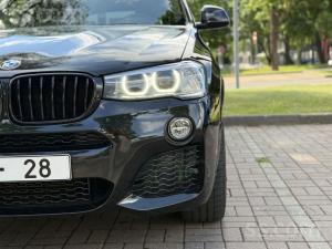 Black BMW X4 2015 in Riga, with an engine capacity of 3.00 L and mileage of 242 thousand km for 16900 €, photo 8 on AUTOMOTO.COM.LV