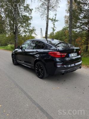 Black BMW X4 2016 in Ogre, with an engine capacity of 3.00 L and mileage of 230 thousand km for 15900 €, photo 3 on AUTOMOTO.COM.LV