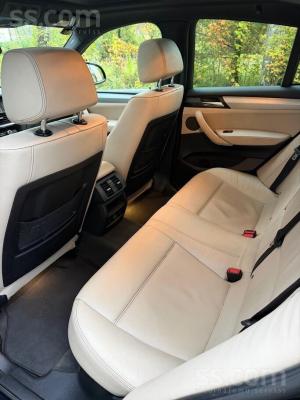 Black BMW X4 2016 in Ogre, with an engine capacity of 3.00 L and mileage of 230 thousand km for 15900 €, photo 6 on AUTOMOTO.COM.LV