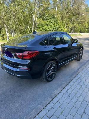Black BMW X4 2015 in Klaipeda, with an engine capacity of 2.00 L and mileage of 158 thousand km for 17300 €, photo 5 on AUTOMOTO.COM.LV