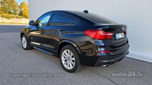 Black BMW X4 2017 in Tartu, with an engine capacity of 2.00 L and mileage of 132 thousand km for 19900 €, photo 4 on AUTOMOTO.COM.LV