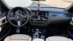 Black BMW X4 2017 in Tartu, with an engine capacity of 2.00 L and mileage of 132 thousand km for 19900 €, photo 6 on AUTOMOTO.COM.LV