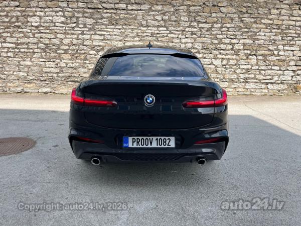Black BMW X4 2019 in Tallinn, with an engine capacity of 3.00 L and mileage of 199 thousand km for 25990 €, photo 6 on AUTOMOTO.COM.LV