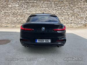 Black BMW X4 2019 in Tallinn, with an engine capacity of 3.00 L and mileage of 199 thousand km for 25990 €, photo 7 on AUTOMOTO.COM.LV