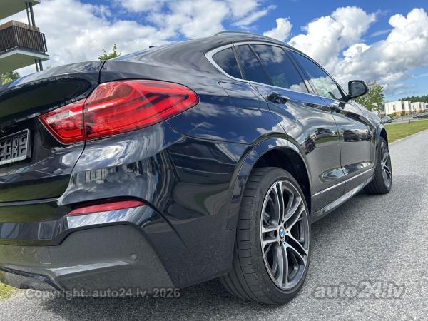 Black BMW X4 2015 in Tallinn, with an engine capacity of 3.00 L and mileage of 190 thousand km for 18880 €, photo 4 on AUTOMOTO.COM.LV