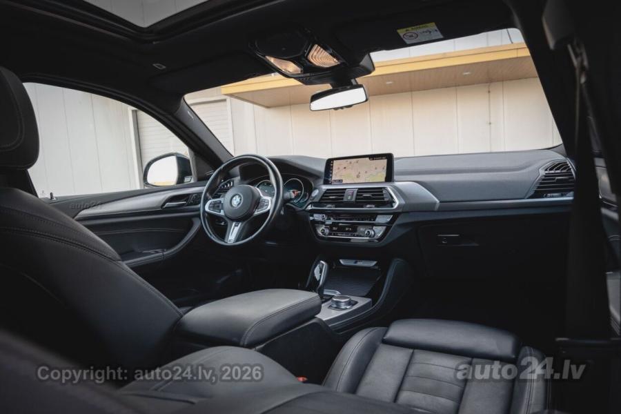 Black BMW X4 2019 in Tartu, with an engine capacity of 3.00 L and mileage of 150 thousand km for 37900 €, photo 12 on AUTOMOTO.COM.LV