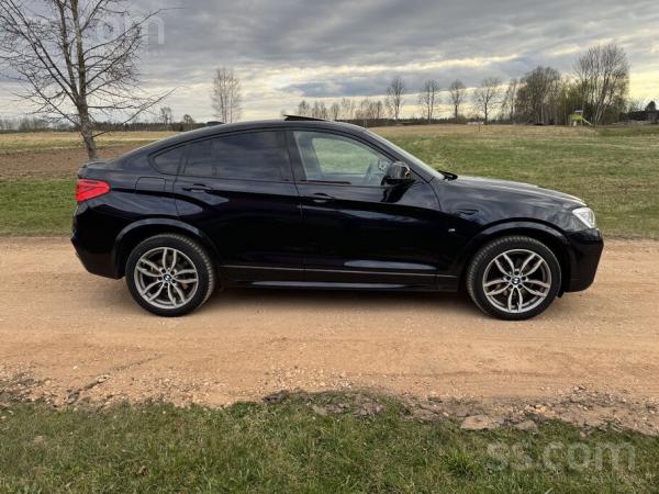 Blue BMW X4 2016 in Riga, with an engine capacity of 2.00 L and mileage of 243 thousand km for 17250 €, photo 4 on AUTOMOTO.COM.LV