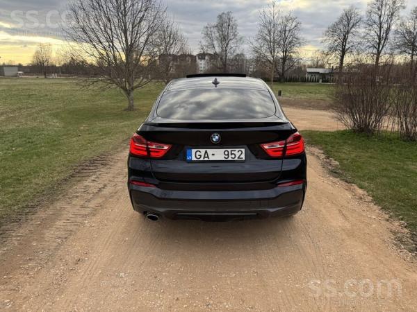 Blue BMW X4 2016 in Riga, with an engine capacity of 2.00 L and mileage of 243 thousand km for 17250 €, photo 6 on AUTOMOTO.COM.LV