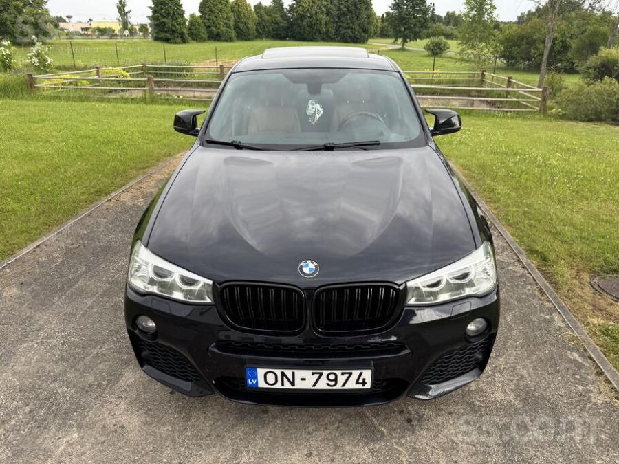 Blue BMW X4 2016 in Riga, with an engine capacity of 2.00 L and mileage of 245 thousand km for 16200 €, photo 4 on AUTOMOTO.COM.LV