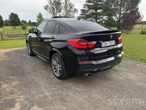 Blue BMW X4 2016 in Riga, with an engine capacity of 2.00 L and mileage of 245 thousand km for 16200 €, photo 5 on AUTOMOTO.COM.LV