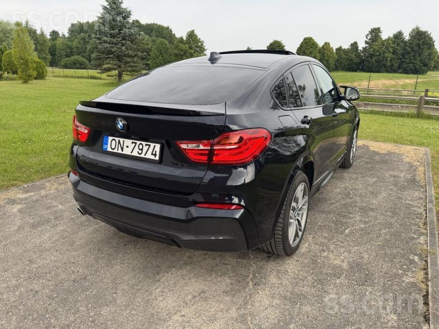 Blue BMW X4 2016 in Riga, with an engine capacity of 2.00 L and mileage of 245 thousand km for 16200 €, photo 6 on AUTOMOTO.COM.LV