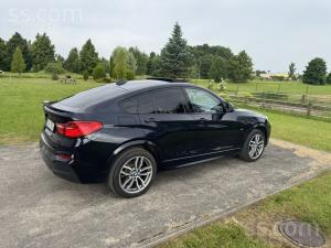 Blue BMW X4 2016 in Riga, with an engine capacity of 2.00 L and mileage of 245 thousand km for 16200 €, photo 7 on AUTOMOTO.COM.LV
