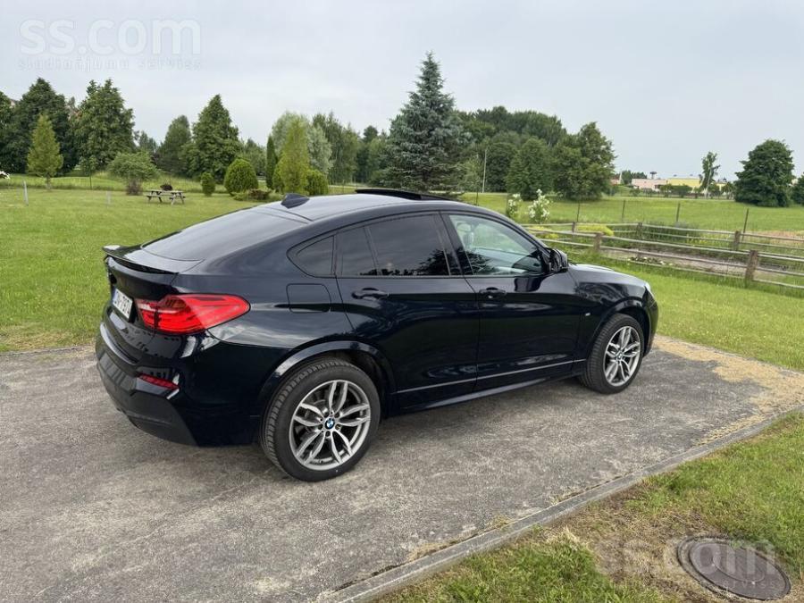 Blue BMW X4 2016 in Riga, with an engine capacity of 2.00 L and mileage of 245 thousand km for 16200 €, photo 7 on AUTOMOTO.COM.LV