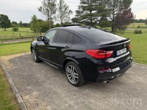 Blue BMW X4 2016 in Riga, with an engine capacity of 2.00 L and mileage of 245 thousand km for 16200 €, photo 8 on AUTOMOTO.COM.LV