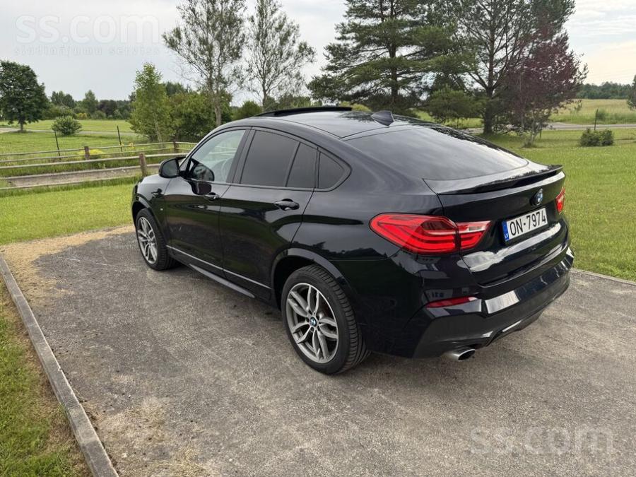 Blue BMW X4 2016 in Riga, with an engine capacity of 2.00 L and mileage of 245 thousand km for 16200 €, photo 8 on AUTOMOTO.COM.LV