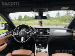 Blue BMW X4 2016 in Riga, with an engine capacity of 2.00 L and mileage of 245 thousand km for 16200 €, photo 11 on AUTOMOTO.COM.LV