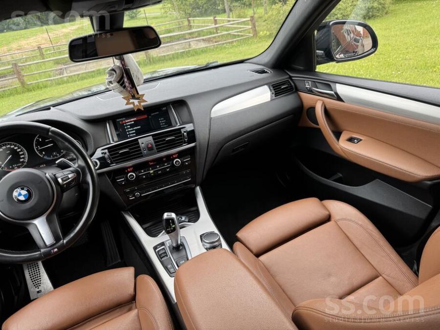 Blue BMW X4 2016 in Riga, with an engine capacity of 2.00 L and mileage of 245 thousand km for 16200 €, photo 12 on AUTOMOTO.COM.LV