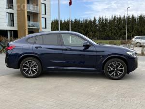 Blue BMW X4 2024 in Riga, with an engine capacity of 2.00 L and mileage of 15 thousand km for 52900 €, photo 4 on AUTOMOTO.COM.LV