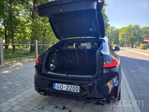 Blue BMW X4 2024 in Riga, with an engine capacity of 2.00 L and mileage of 33 thousand km for 56990 €, photo 4 on AUTOMOTO.COM.LV