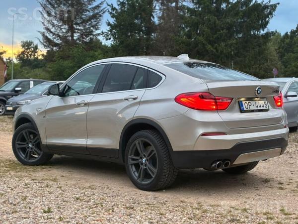 Grey BMW X4 2014 in Kuldiga, with an engine capacity of 3.00 L and mileage of 244 thousand km for 14690 €, photo 3 on AUTOMOTO.COM.LV