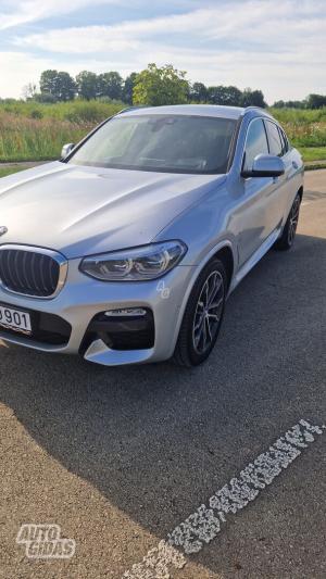Grey BMW X4 2019 in Vilnius, with an engine capacity of 3.00 L and mileage of 248 thousand km for 26300 €, photo 5 on AUTOMOTO.COM.LV