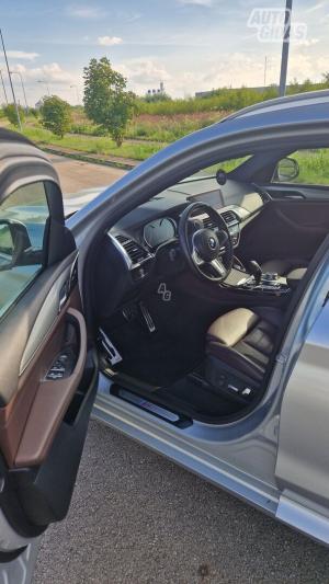 Grey BMW X4 2019 in Vilnius, with an engine capacity of 3.00 L and mileage of 248 thousand km for 26300 €, photo 15 on AUTOMOTO.COM.LV