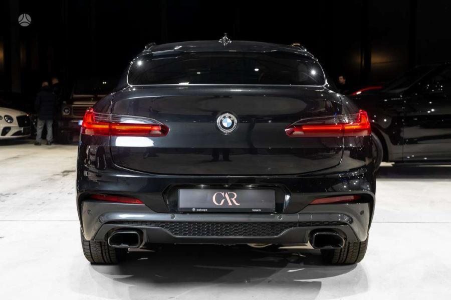 Black BMW x4-m 2019 in Riga, with an engine capacity of 2.99 L and mileage of 156 thousand km for 33900 €, photo 5 on AUTOMOTO.COM.LV