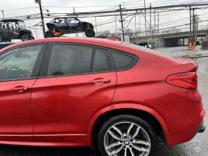 Red BMW x4-m 2017 in Siauliai, with an engine capacity of 2.98 L and mileage of 150 thousand km for 14508 €, photo 4 on AUTOMOTO.COM.LV