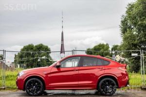 Red BMW X4 2014 in Riga, with an engine capacity of 3.00 L and mileage of 155 thousand km for 24500 €, photo 5 on AUTOMOTO.COM.LV
