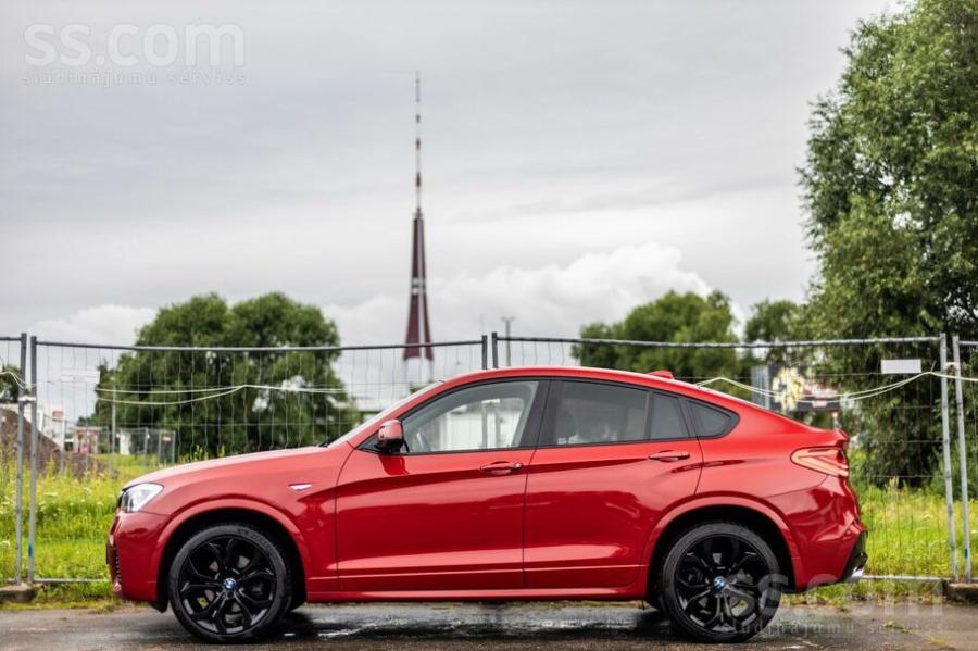 Red BMW X4 2014 in Riga, with an engine capacity of 3.00 L and mileage of 155 thousand km for 24500 €, photo 5 on AUTOMOTO.COM.LV