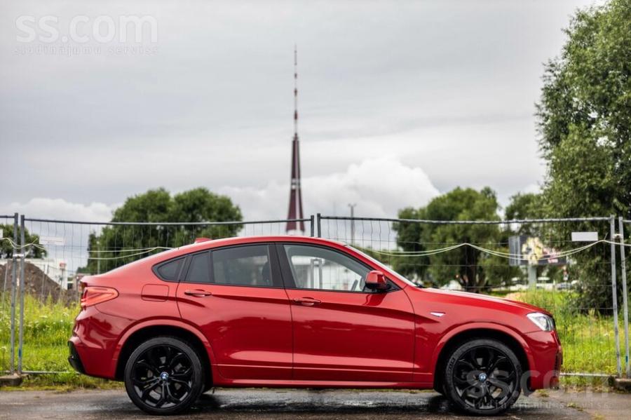 Red BMW X4 2014 in Riga, with an engine capacity of 3.00 L and mileage of 155 thousand km for 24500 €, photo 6 on AUTOMOTO.COM.LV