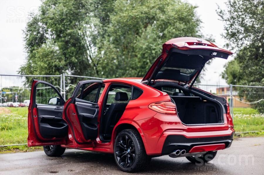 Red BMW X4 2014 in Riga, with an engine capacity of 3.00 L and mileage of 155 thousand km for 24500 €, photo 10 on AUTOMOTO.COM.LV