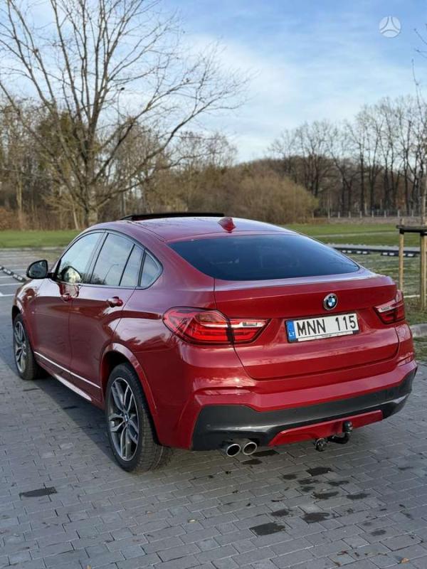 Red BMW X4 2015 in Kaunas, with an engine capacity of 2.99 L and mileage of 265 thousand km for 17250 €, photo 7 on AUTOMOTO.COM.LV