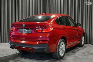 Red BMW X4 2015 in Marijampole, with an engine capacity of 3.00 L and mileage of 275 thousand km for 16650 €, photo 13 on AUTOMOTO.COM.LV