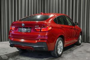 Red BMW X4 2015 in Marijampole, with an engine capacity of 3.00 L and mileage of 275 thousand km for 16250 €, photo 14 on AUTOMOTO.COM.LV
