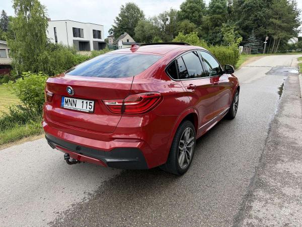 Red BMW X4 2015 in Kaunas, with an engine capacity of 2.99 L and mileage of 265 thousand km for 16999 €, photo 8 on AUTOMOTO.COM.LV