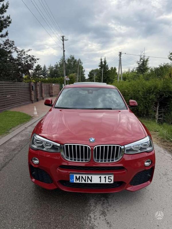 Red BMW X4 2016 in Kaunas, with an engine capacity of 2.99 L and mileage of 265 thousand km for 15999 €, photo 5 on AUTOMOTO.COM.LV