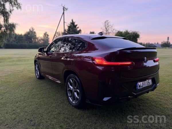 Red BMW X4 2021 in Riga, with an engine capacity of 2.00 L and mileage of 89 thousand km for 43000 €, photo 3 on AUTOMOTO.COM.LV