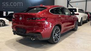 Red BMW X4 2021 in Riga, with an engine capacity of 2.00 L and mileage of 98 thousand km for 34990 €, photo 7 on AUTOMOTO.COM.LV