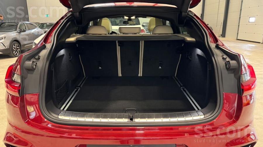 Red BMW X4 2021 in Riga, with an engine capacity of 2.00 L and mileage of 98 thousand km for 34990 €, photo 25 on AUTOMOTO.COM.LV